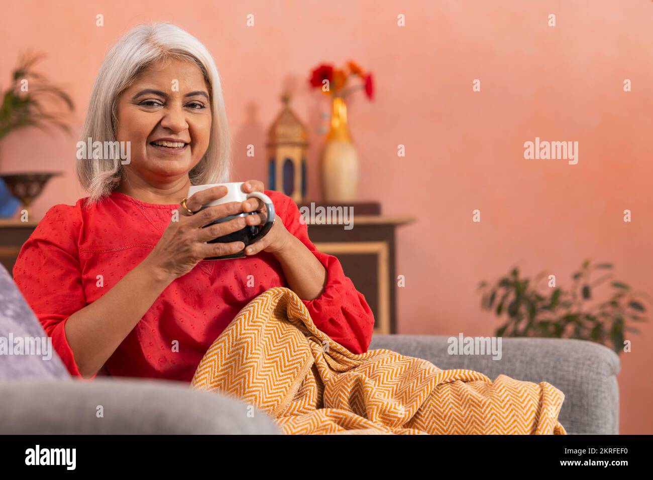 Old lady drinking tea hi-res stock photography and images - Alamy