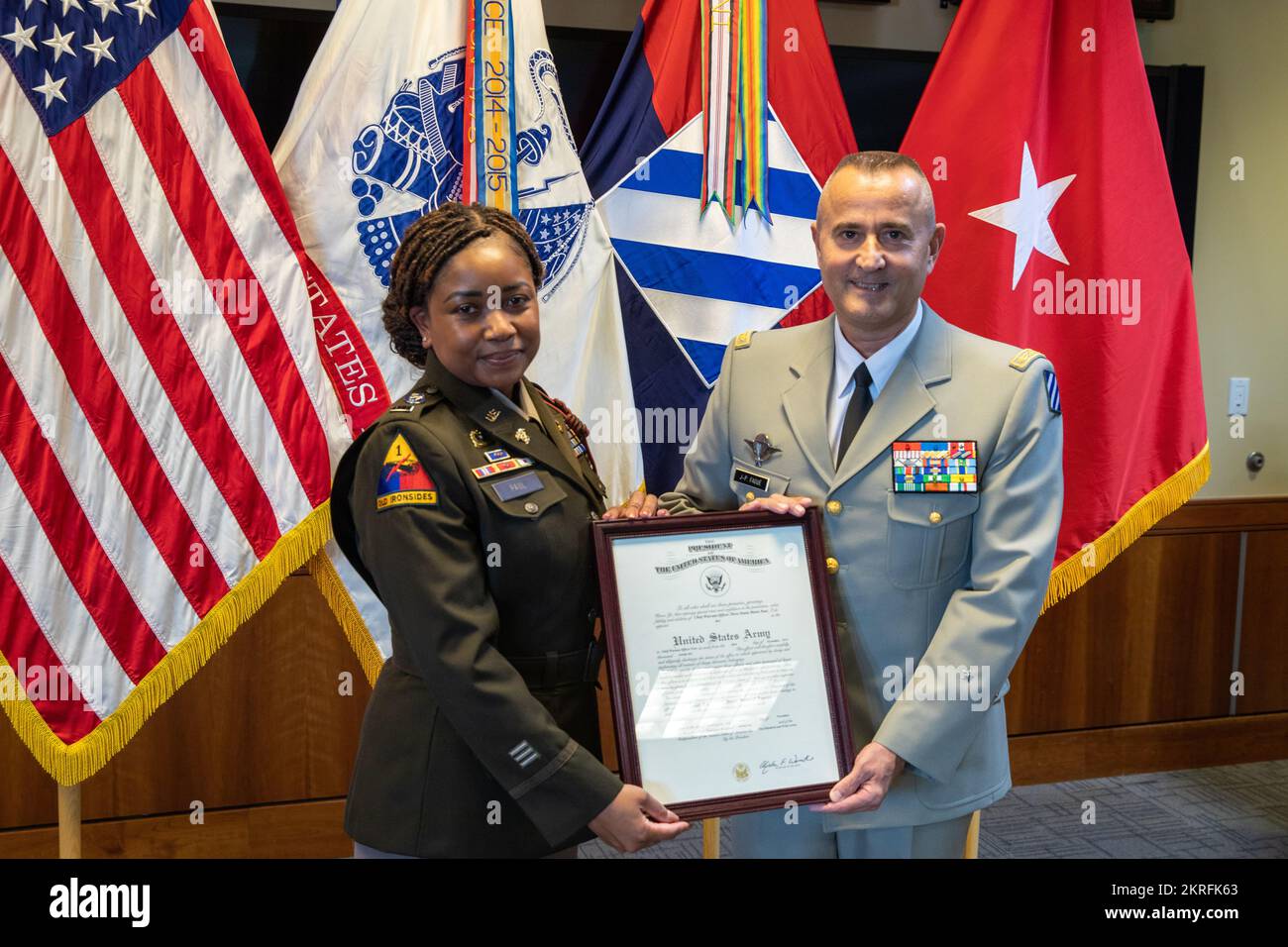 Chief Warrant Officer 4 Danie M. Paul, left, a food technician assigned ...