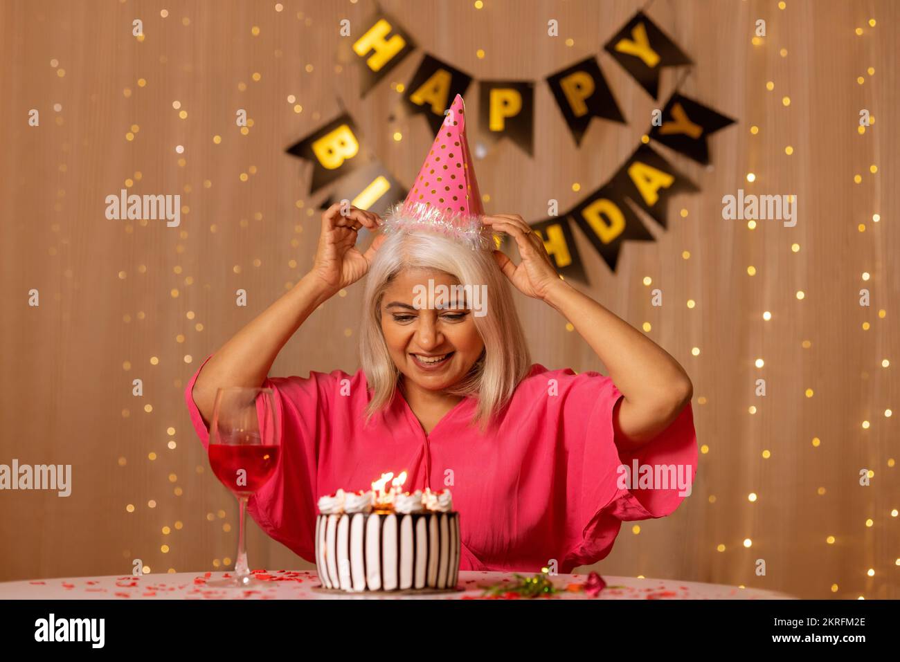 Old lady celebrating her birthday at home Stock Photo - Alamy