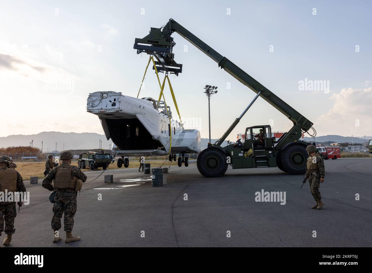 U.S. Marines with Marine Wing Support Squadron (MWSS) 171 crane a ...