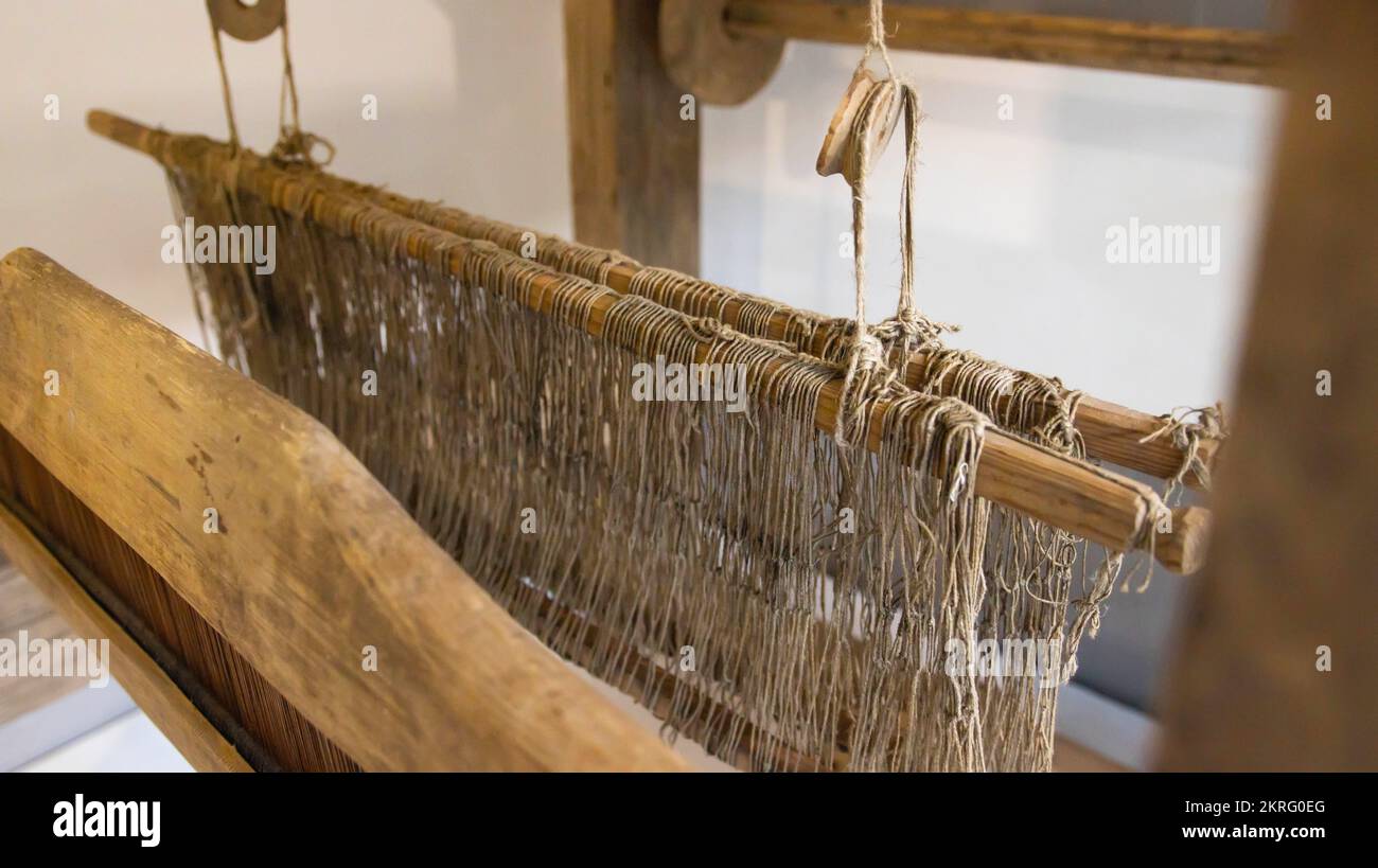 Old loom. Device for the manufacture of textile products, close-up ...