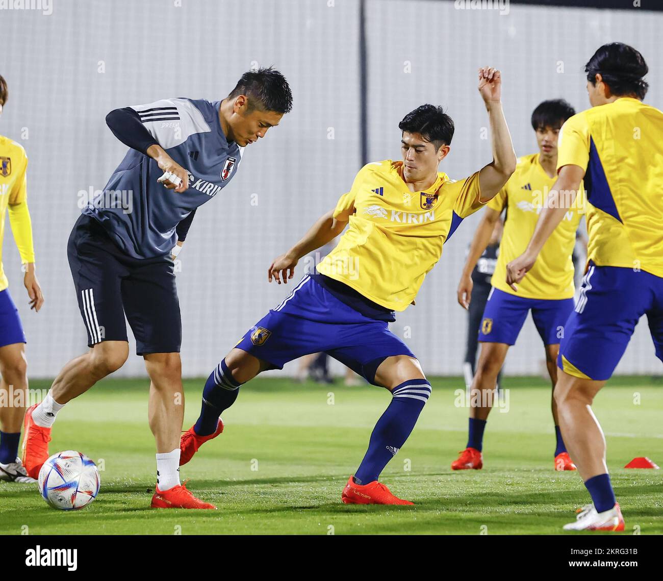 Japan goalkeeper Eiji Kawashima (L) and defender Shogo Taniguchi (C ...