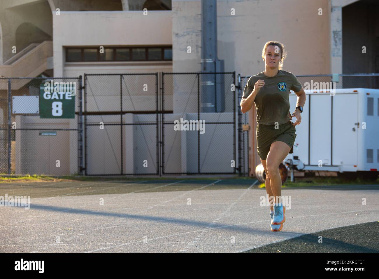 U.S. Marine Corps Capt. Grace Jenkins, Marine Officer Instructor, runs ...