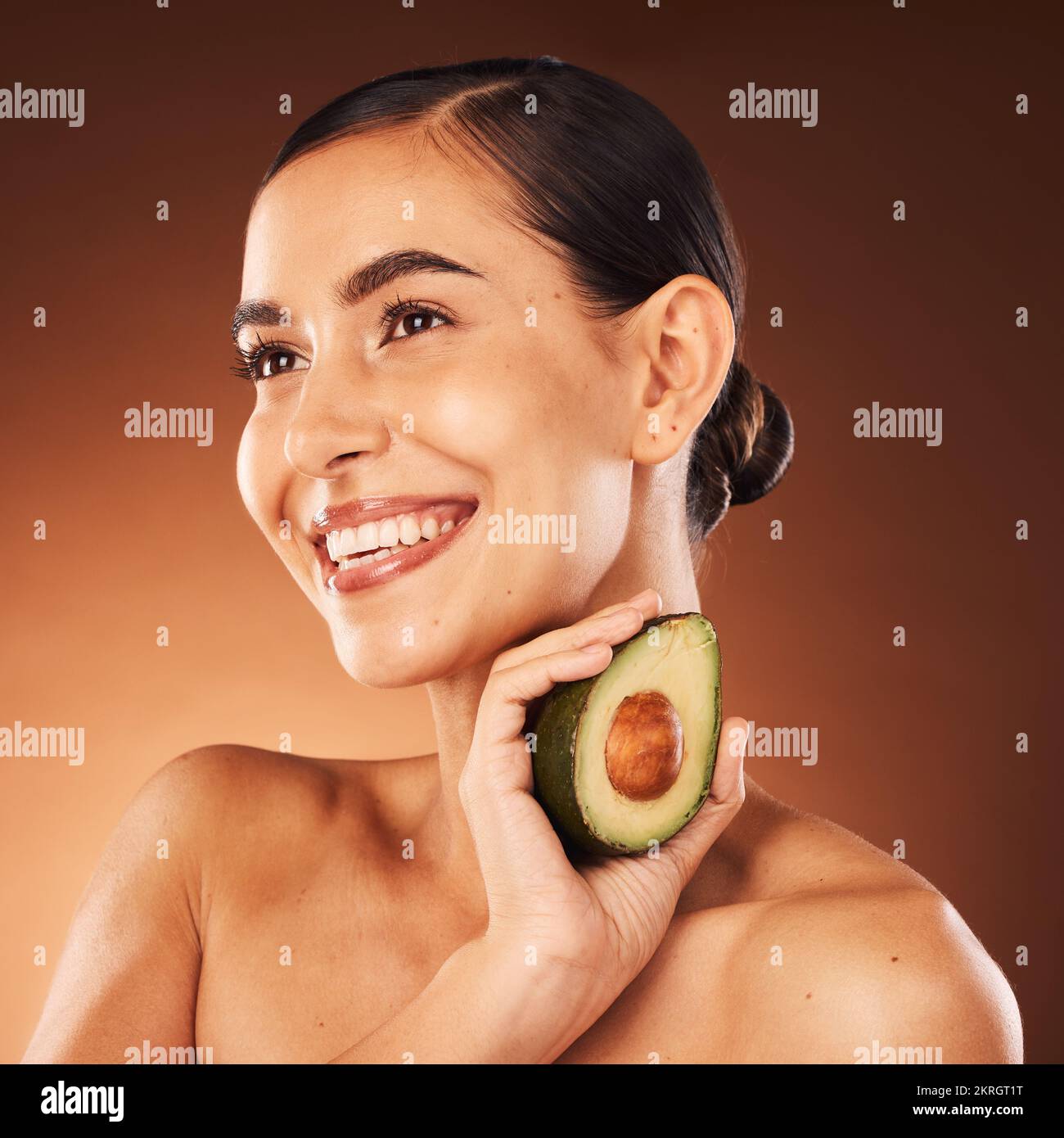 Beauty, wellness and woman in studio with avocado for diet, healthy ...