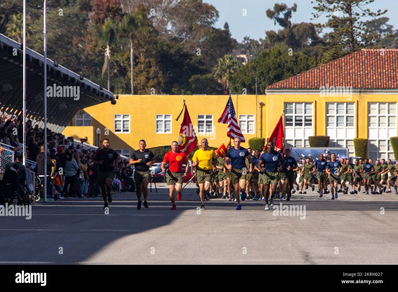 U.S. Marine Corps drill masters with Recruit Training Regiment lead a ...