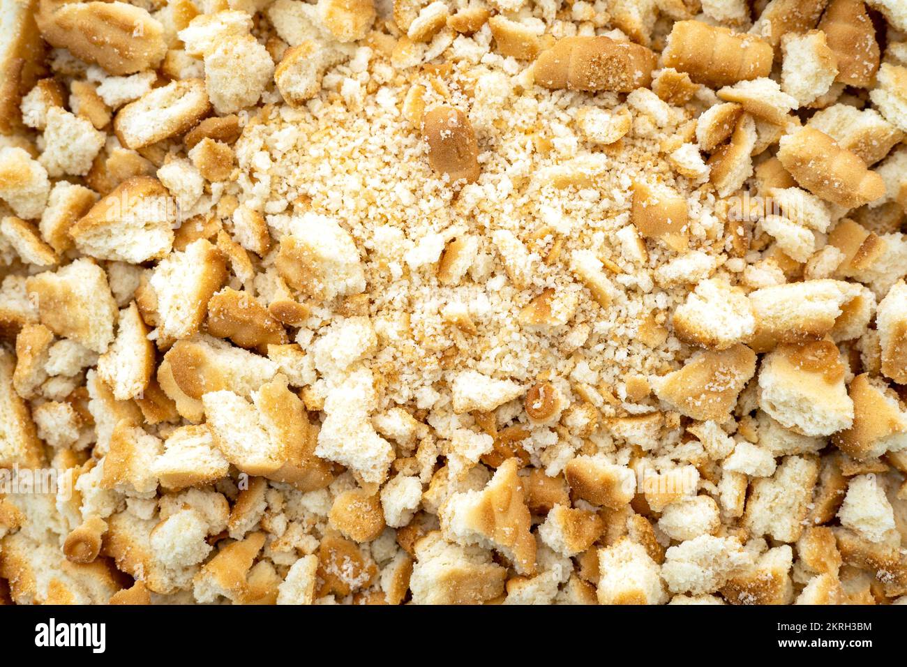Close-up of a pile dried broken pieces of biscuit, heap of sweet bread ...