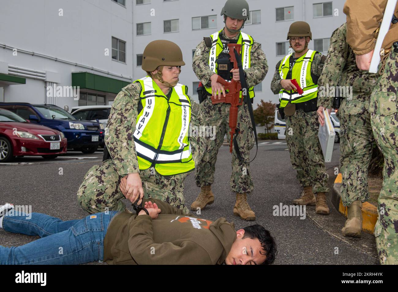 From left, Master-at-Arms 1st Class Hannah Sutton, Master-at-Arms 2nd ...