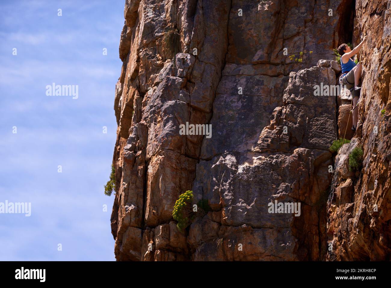 She thrives on risk... thats why she likes rock climbing. a female ...