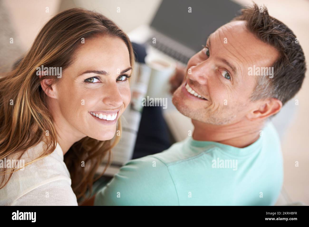 Making the most of their lazy Saturday. Portrait of a couple relaxing ...