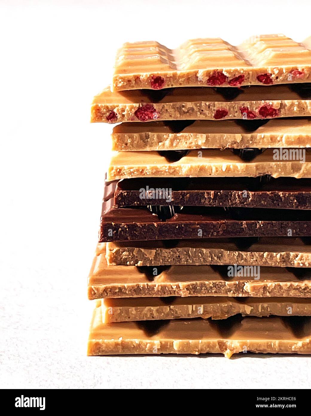 Chocolate products of different types on a white background close-up ...