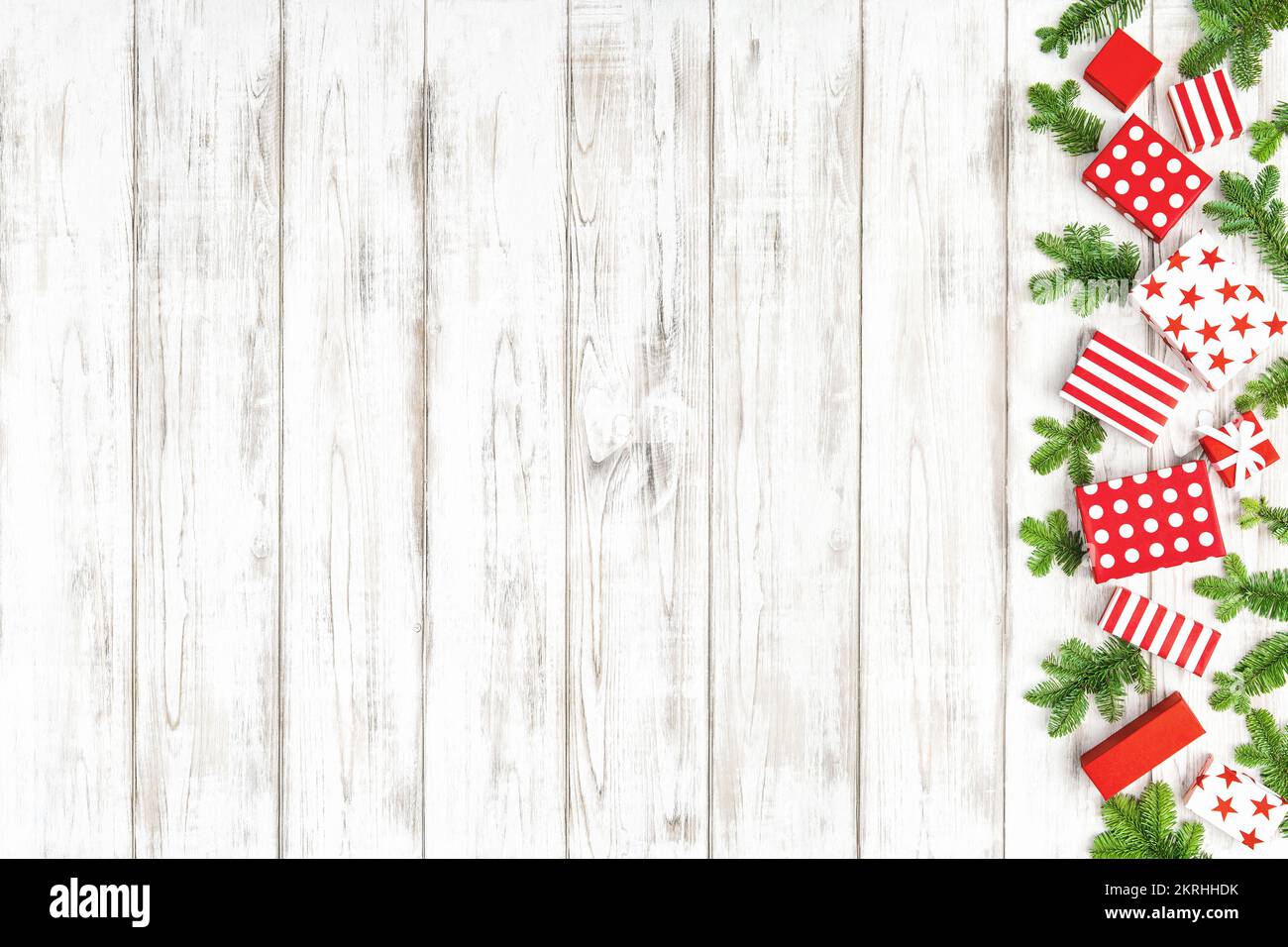 Christmas border. Gift box pine tree branches wooden background Stock ...