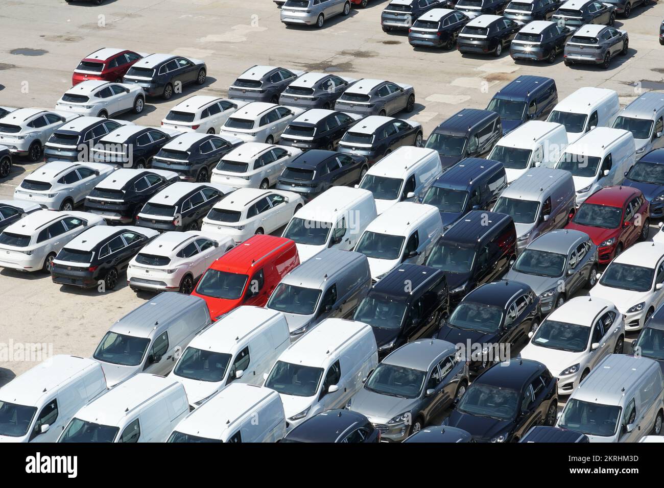 Parked new cars from different producers and colors recently discharged ...