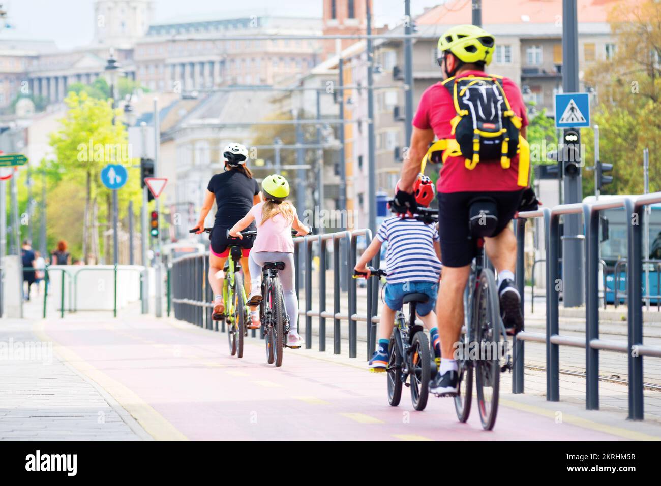 Riding bicycle helmet city hi-res stock photography and images - Alamy