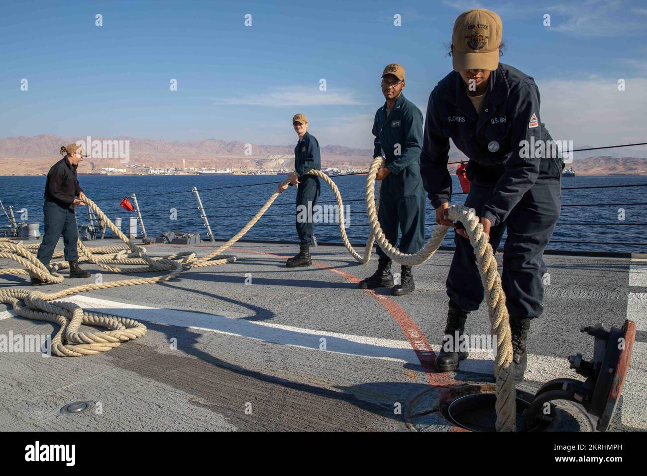 221117-N-EH998-1065 RED SEA (Nov. 17, 2022) Sailors handle line aboard ...
