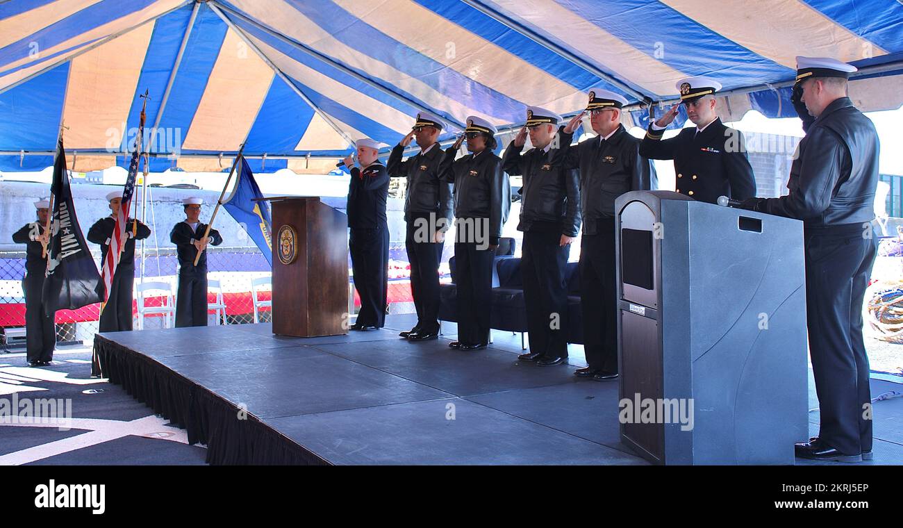 Sailors salute during a change of command ceremony aboard the guided ...