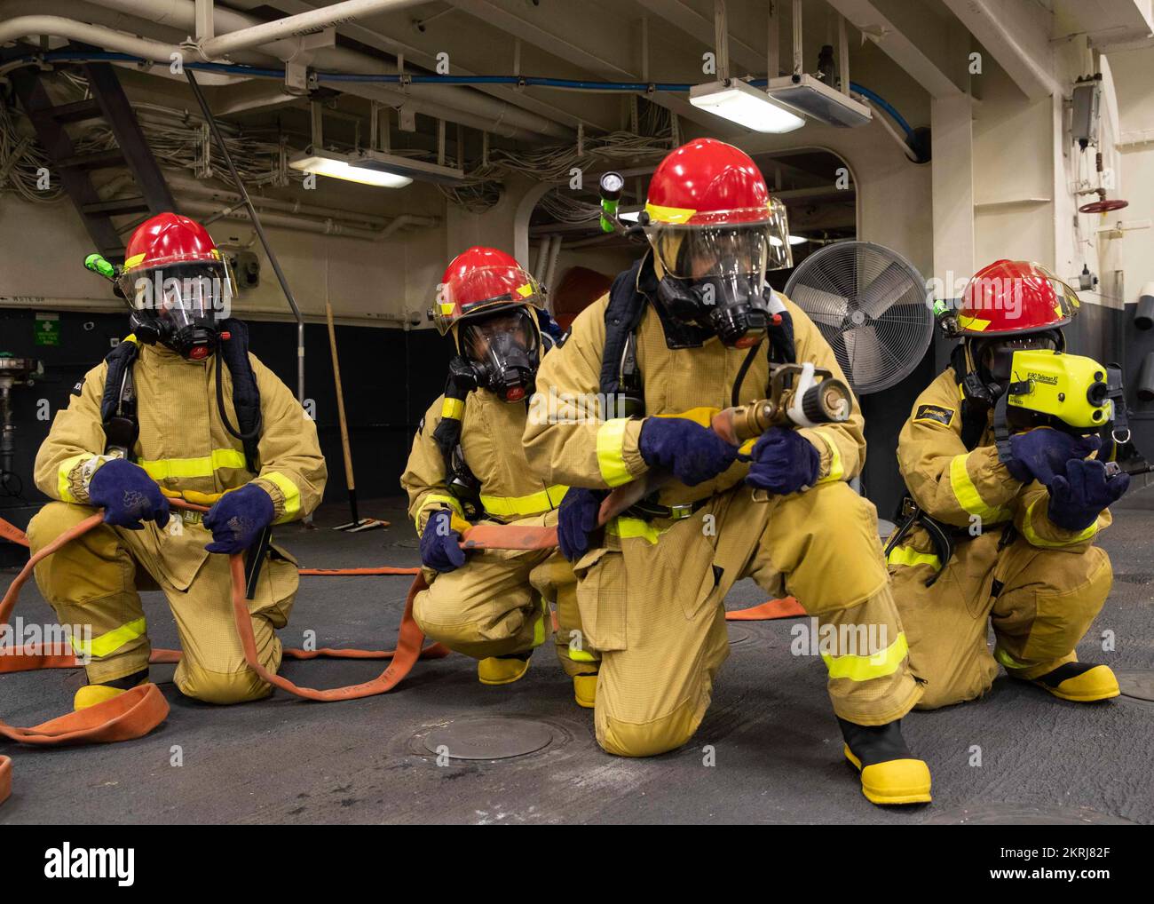 221118-N-TT639-1029 PACIFIC OCEAN (Nov. 18, 2022) – Sailors fight a simulated fire during a ...