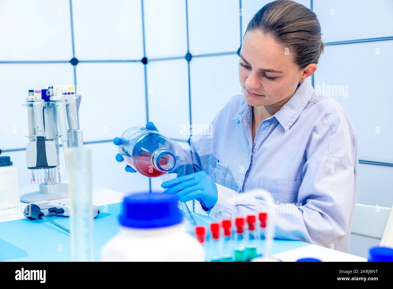food quality inspection laboratory young woman controls the quality of ...