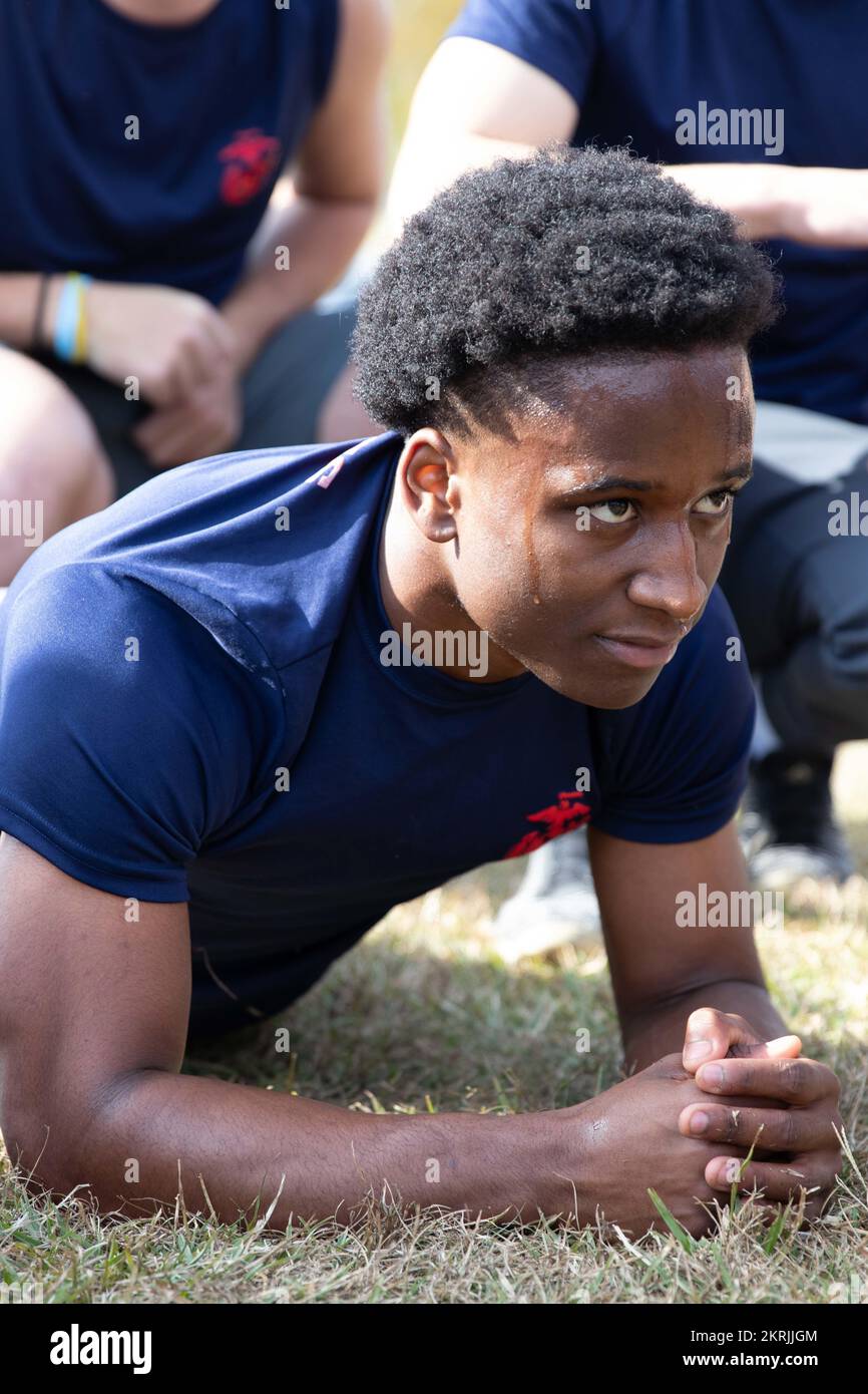 A future Marine holds a plank position at the Marine Corps Recruiting ...