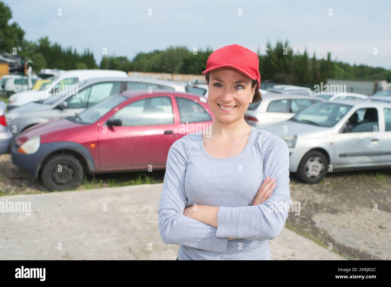 female mechanic posing outside a garage Stock Photo - Alamy