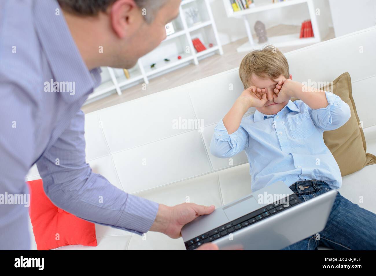Child sad or tired because of a computer Stock Photo - Alamy