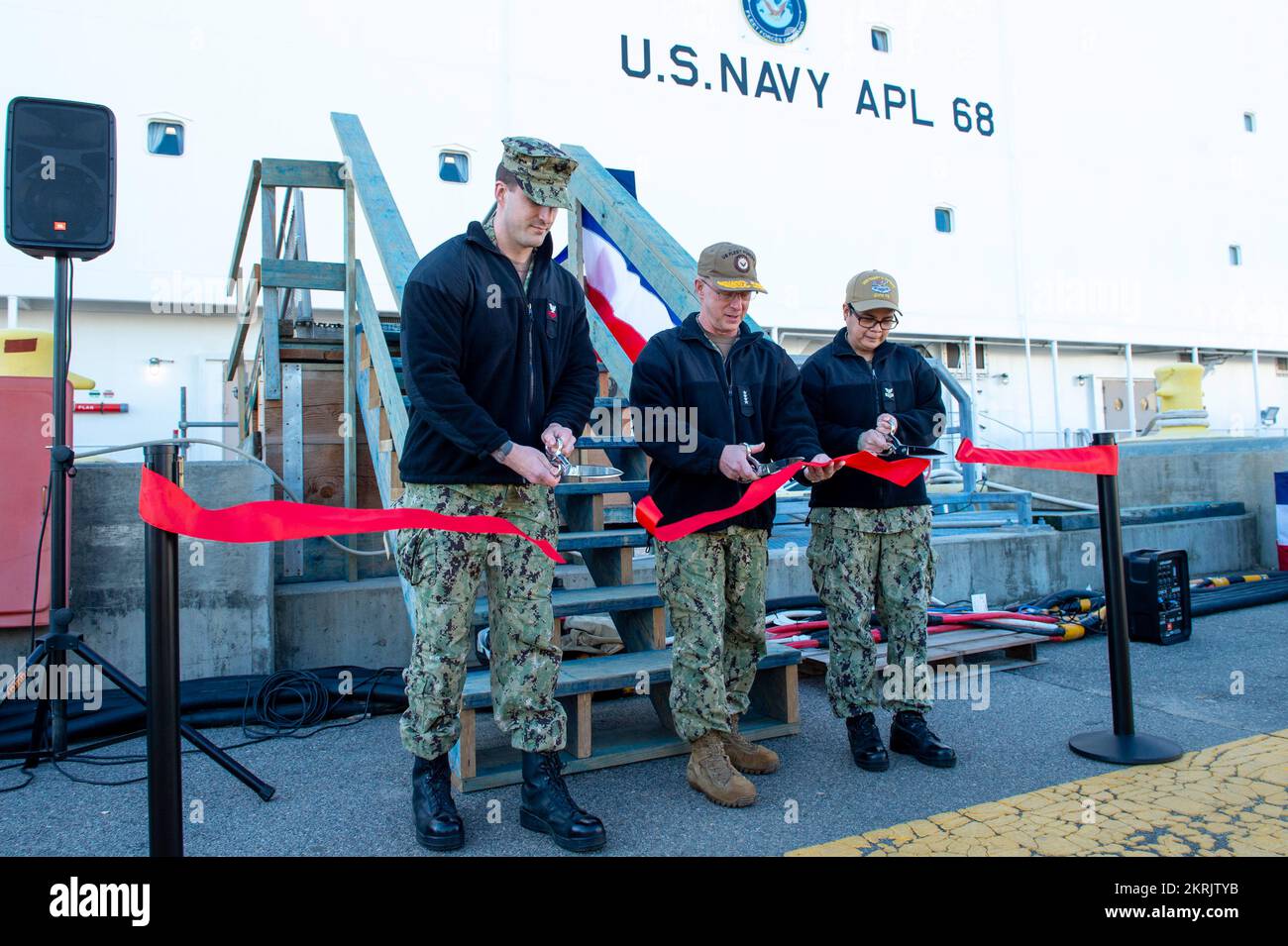 Adm. Daryl Caudle, commander, U.S. Fleet Forces Command, cuts a ribbon ...