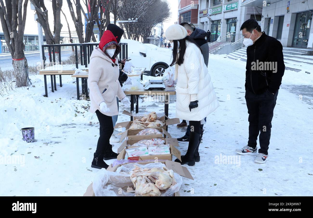 Citizens are shopping non-staple food at the stall in Urumqi City ...