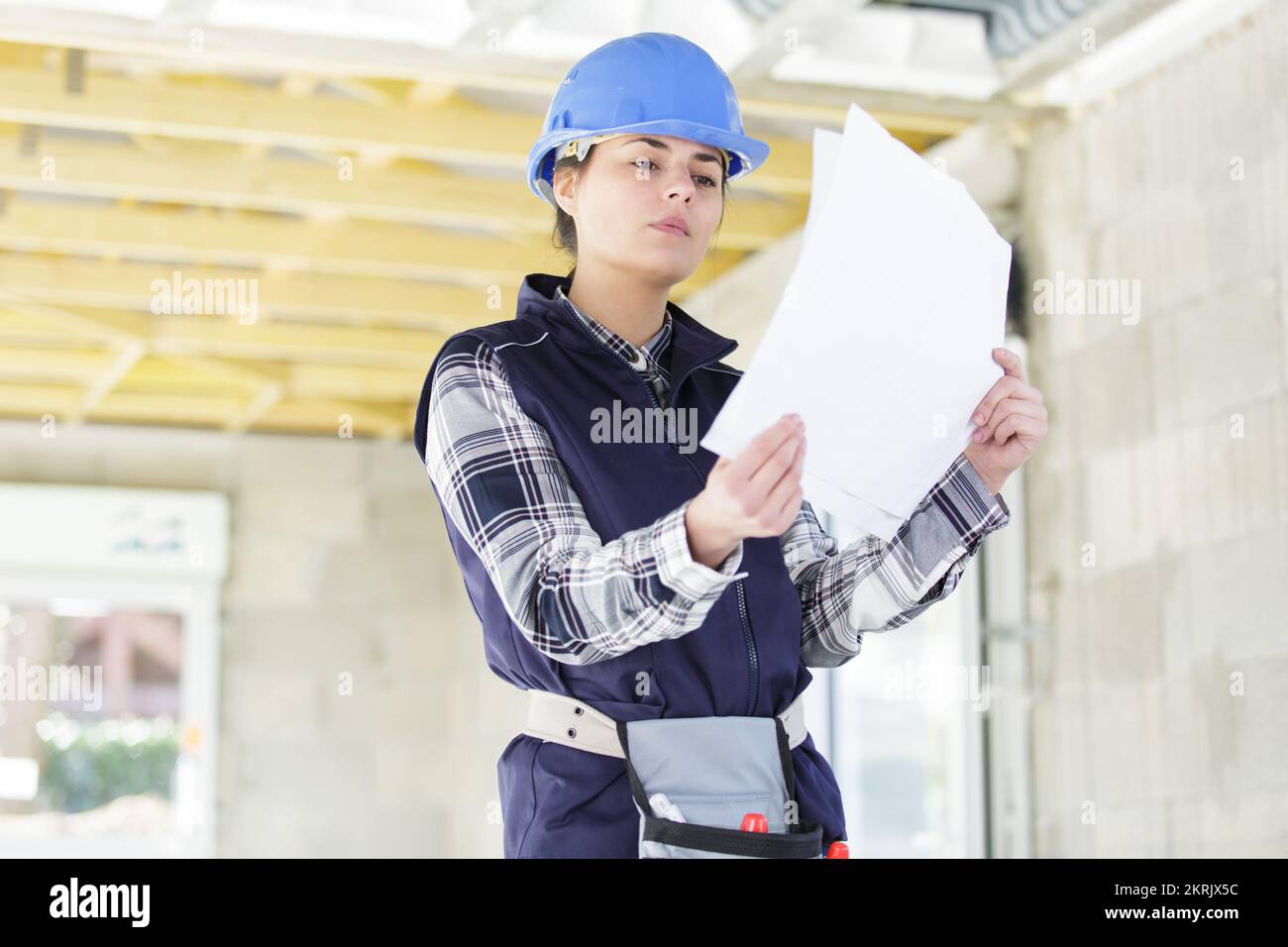 woman builder planning new building construction Stock Photo - Alamy