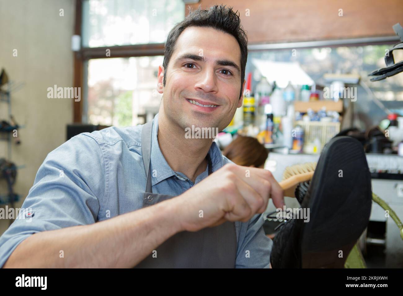 Brushing the shoe hi-res stock photography and images - Alamy