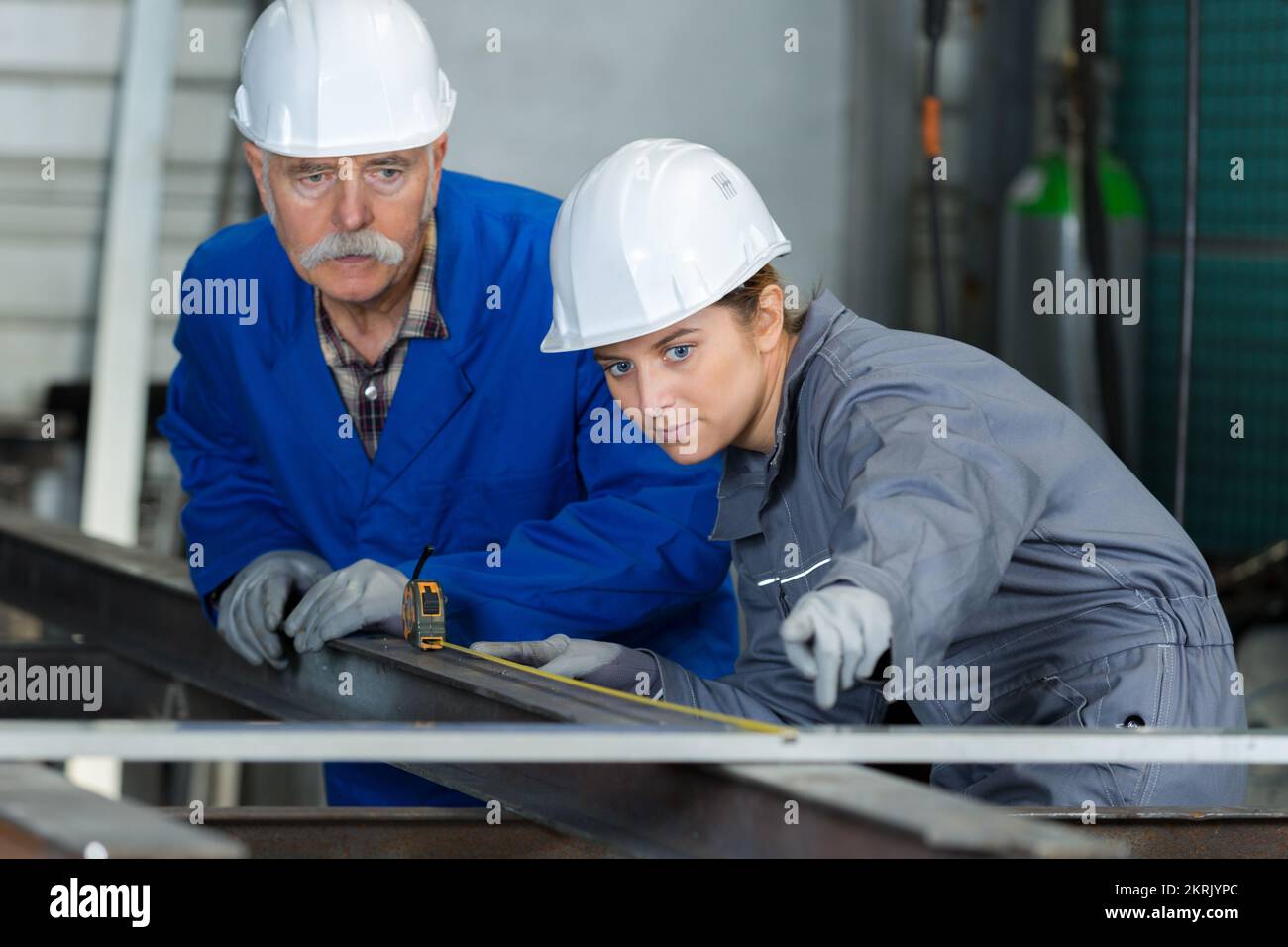 production positive workers at windows at factory Stock Photo - Alamy