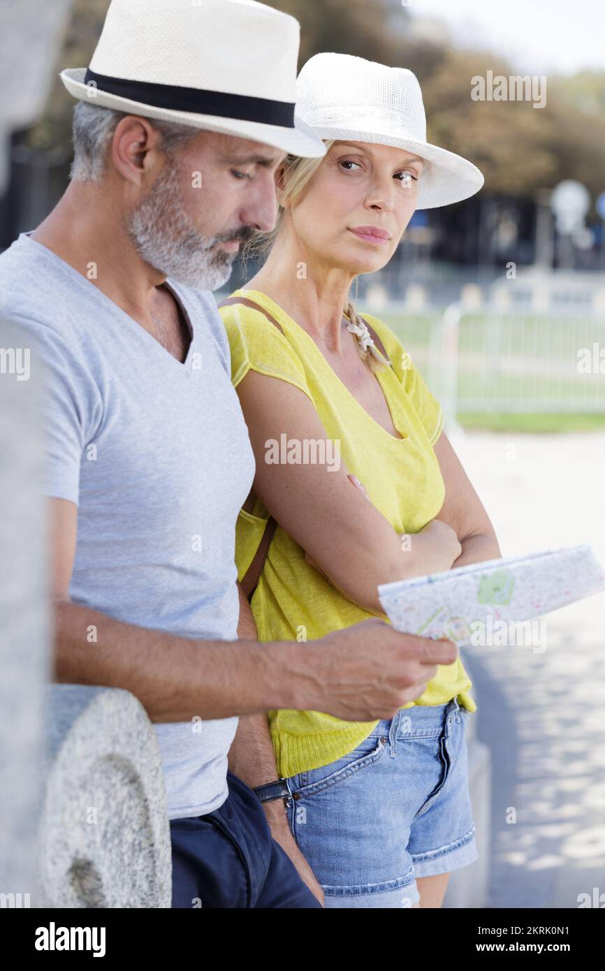 angry couple lost in the city Stock Photo - Alamy