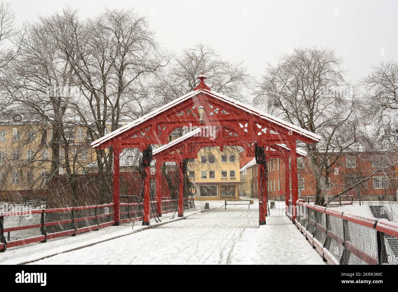 Snowfall in Norwegian city Trondheim, view of the snowy The Old Bridge ...