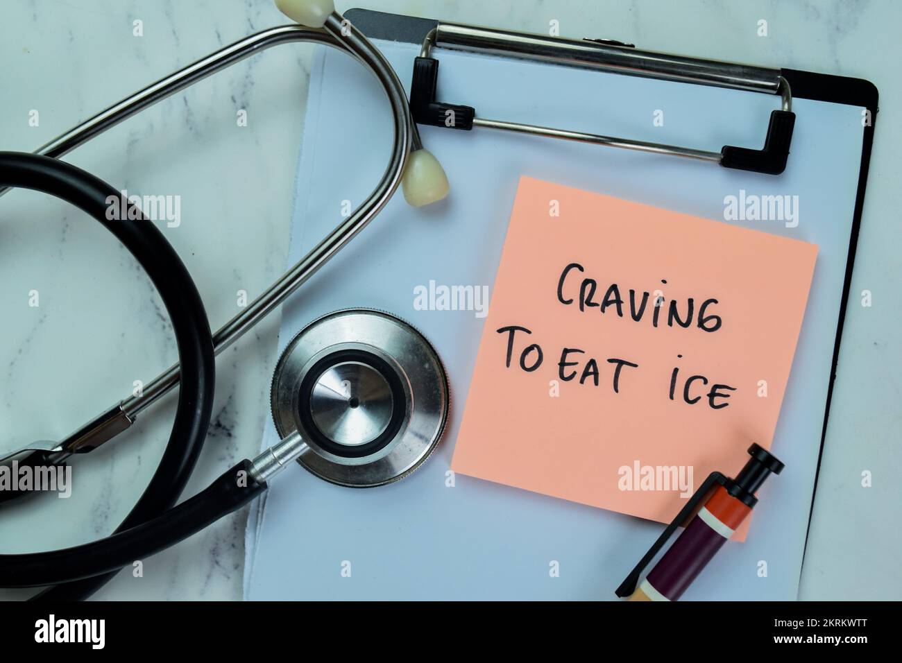 Concept of Craving to Eat Ice write on sticky notes with stethoscope ...