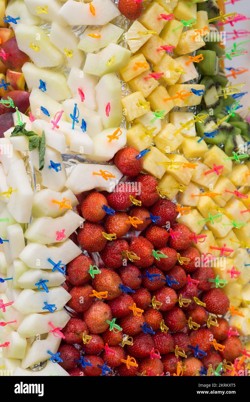 decorative welcome fruit bowl strawberries, pineapple, apple, peach ...