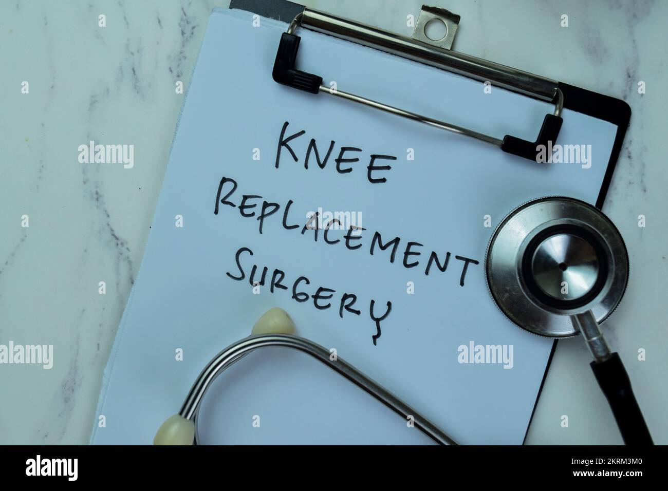 Concept of Knee Replacement Surgery write on paperwork isolated on ...