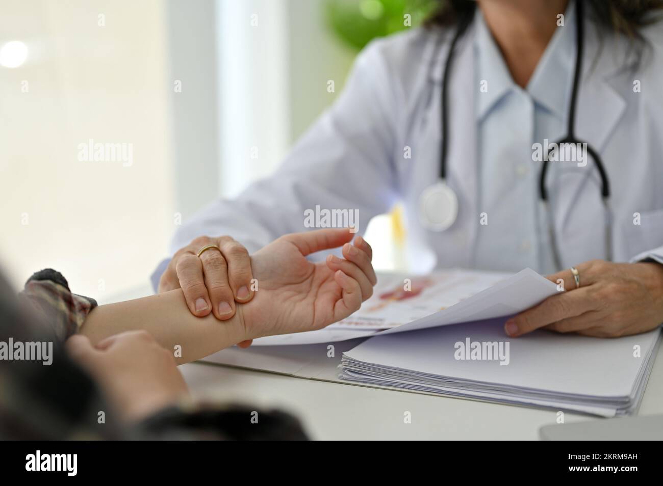 close-up and cropped shot, Professional Asian aged female doctor ...
