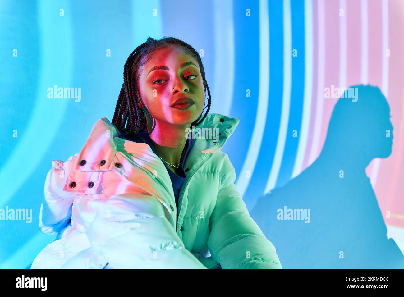 Woman in black puffer hi-res stock photography and images - Alamy