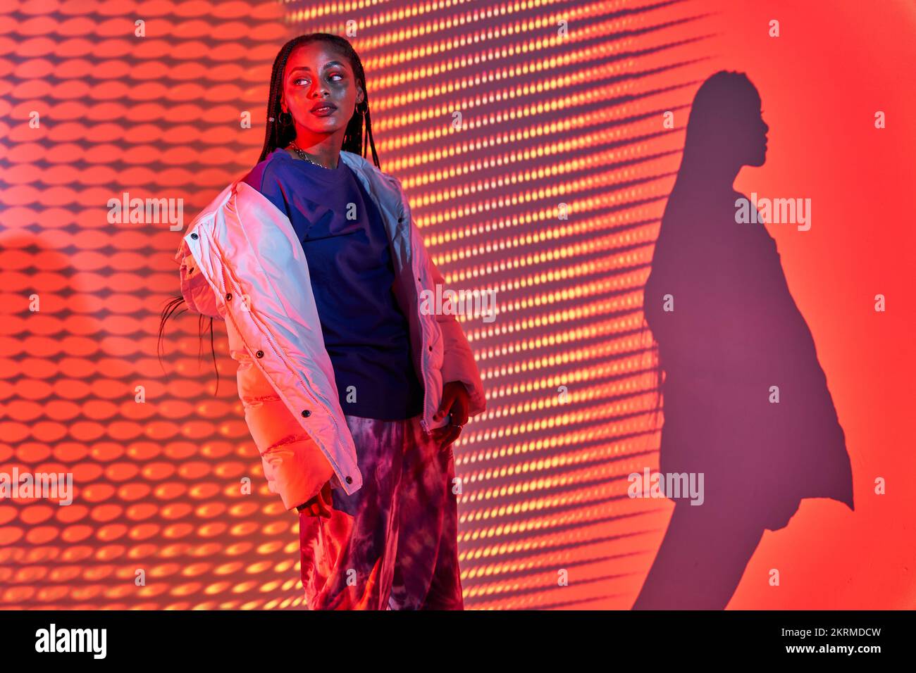 Full body of young confident African American female millennial with ...