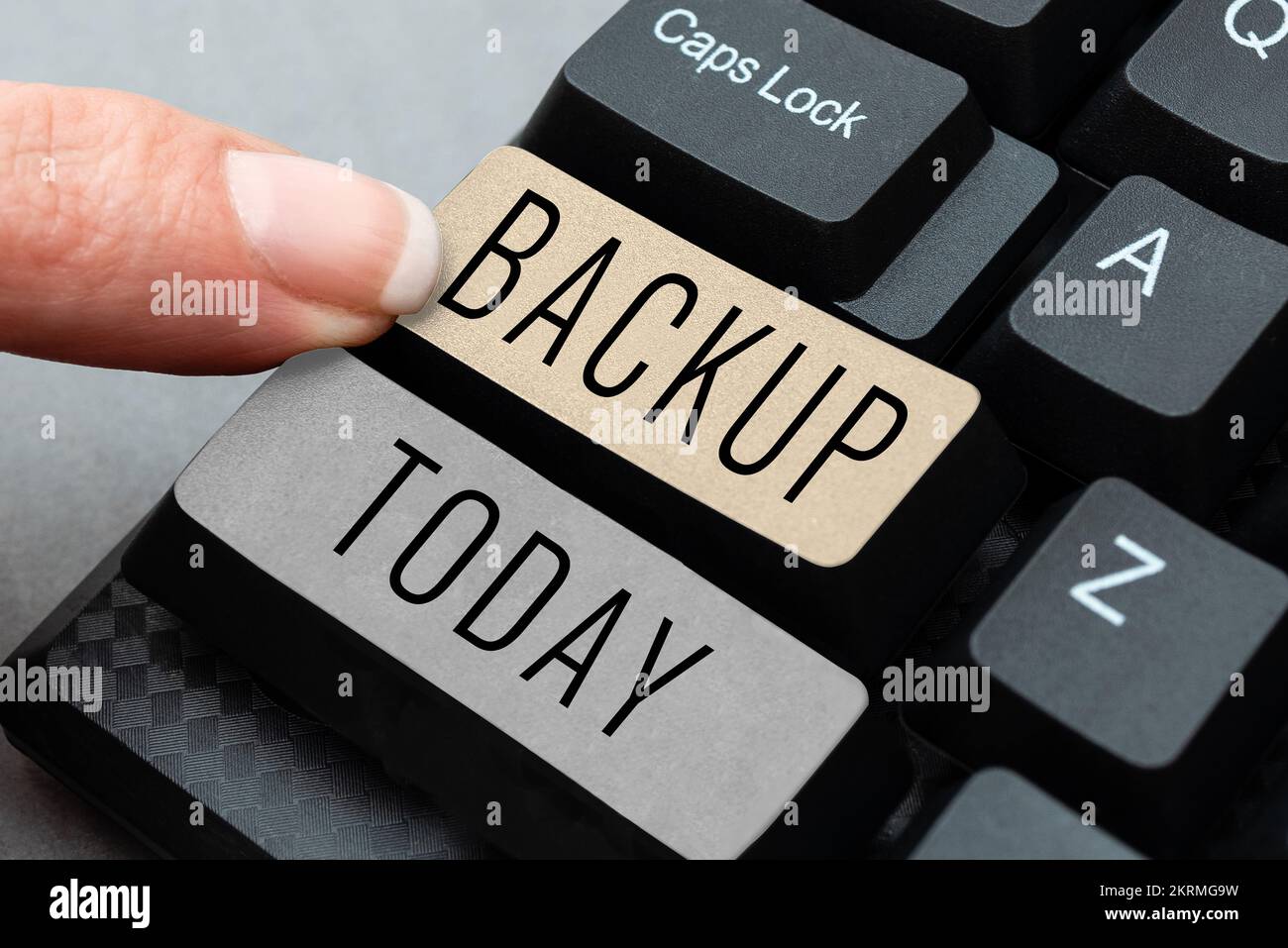 Conceptual caption Backup, Word Written on copy of file or other item ...