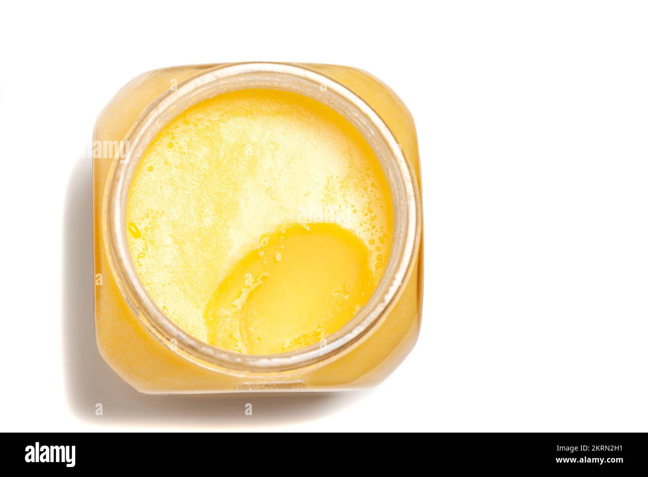 Ghee in jar isolated on white background,top view Stock Photo - Alamy