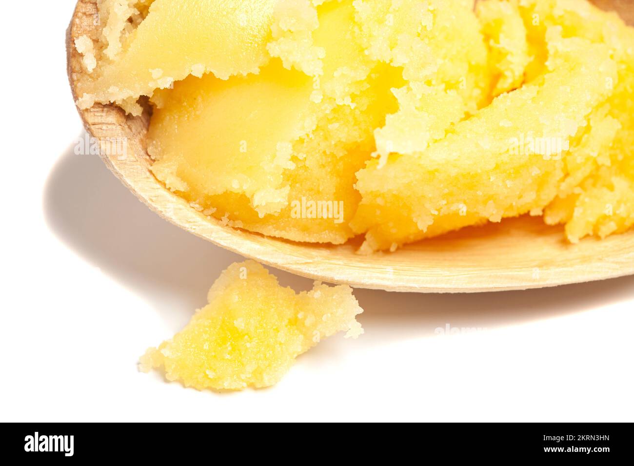 Ghee in wooden spoon isolated on white background,top view Stock Photo ...