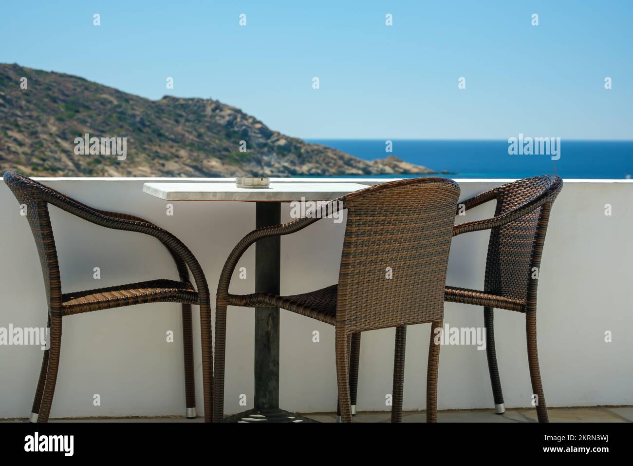 Amazing view from a balcony with chairs and a table overlooking the ...