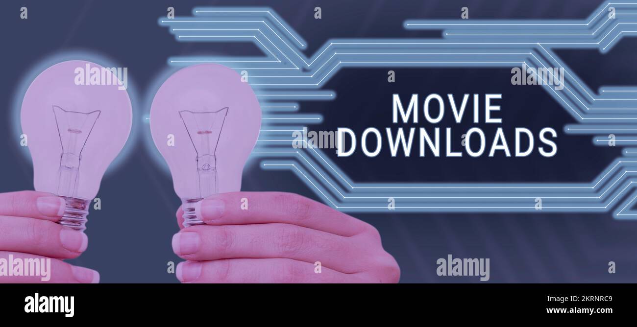 Sign displaying Movie Downloads, Word Written on transfers entire film ...