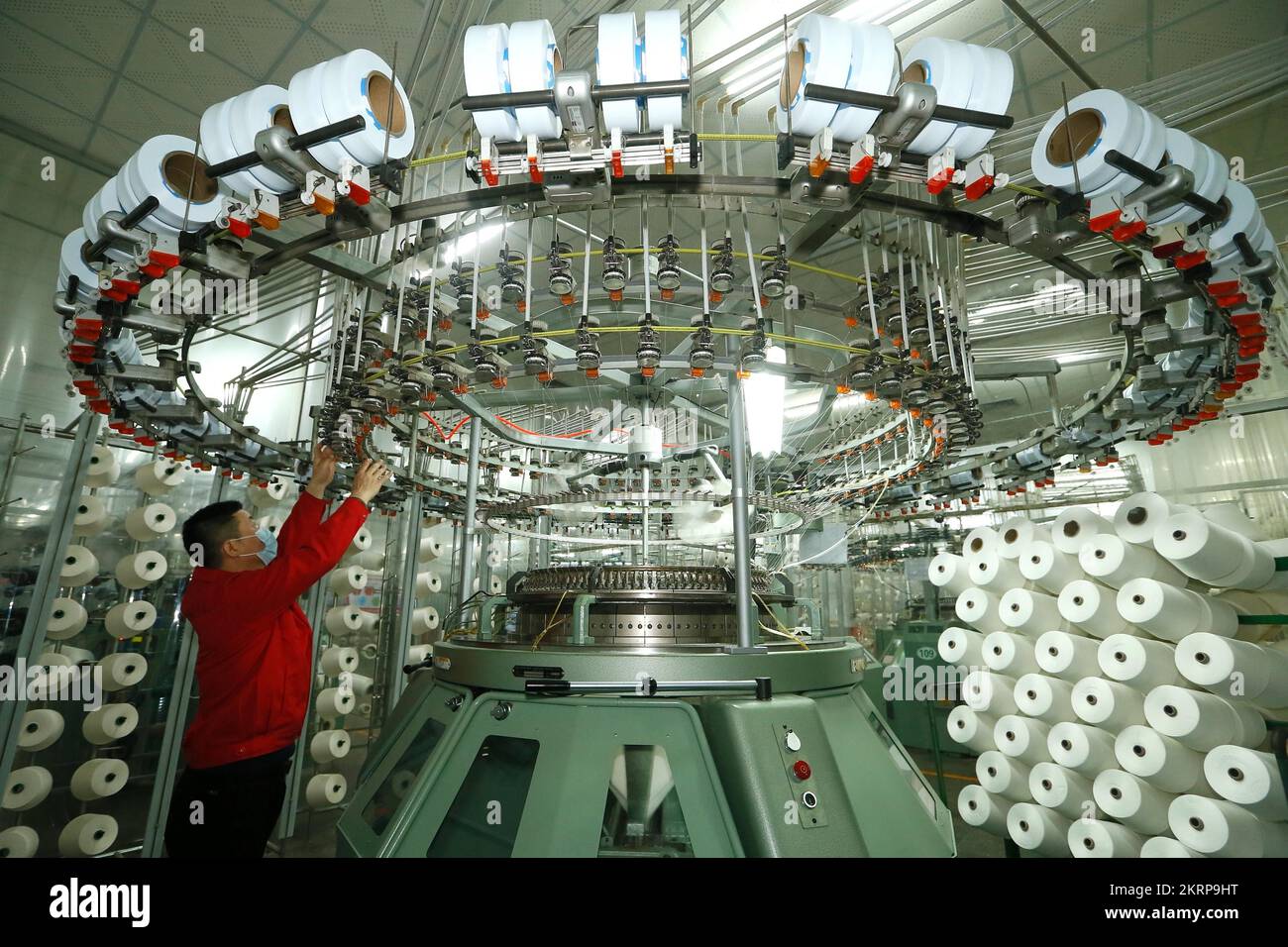 Workers are on the textile assembly line and completing export orders ...