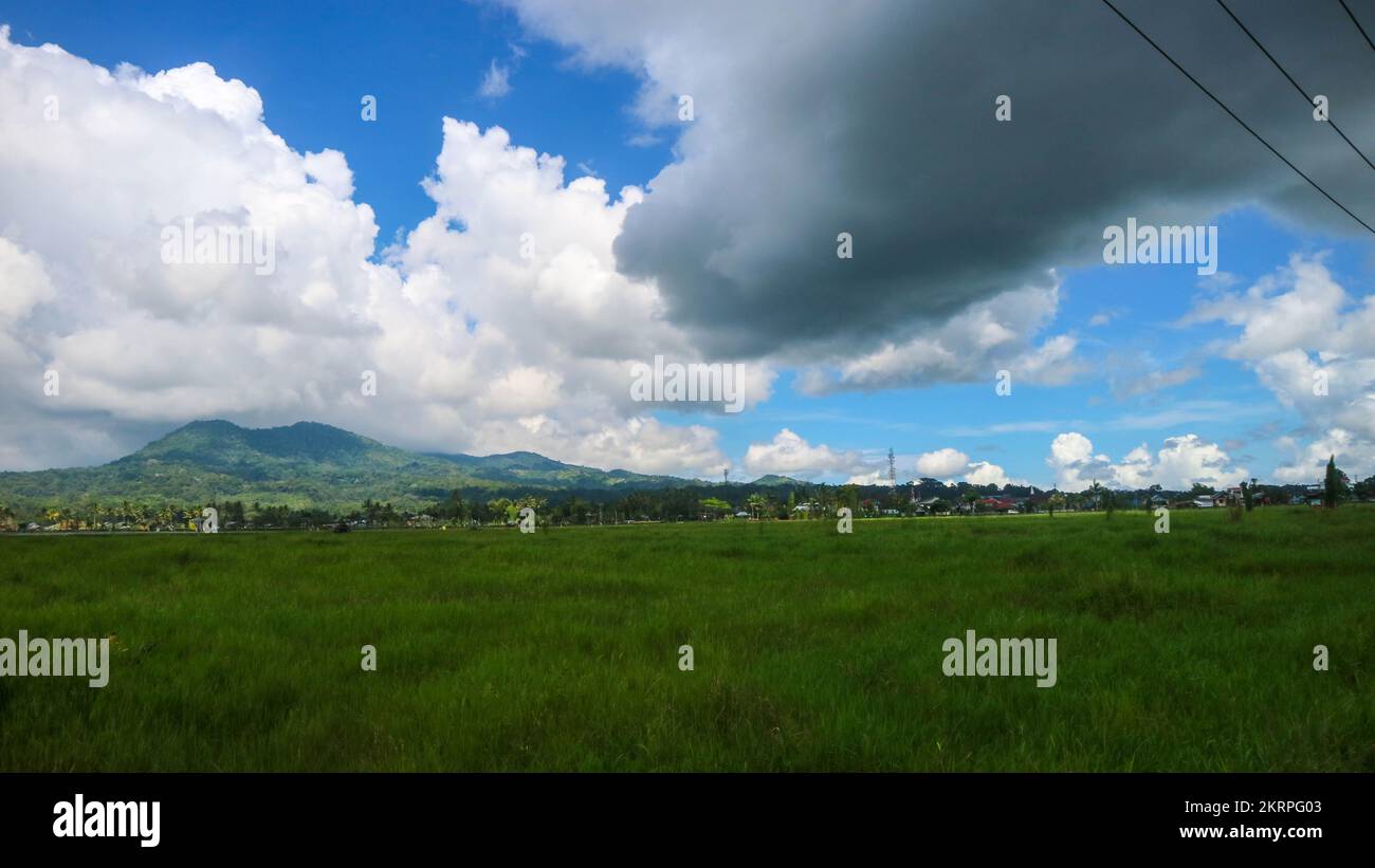 beautiful mountains with cloudy blue sky Stock Photo - Alamy