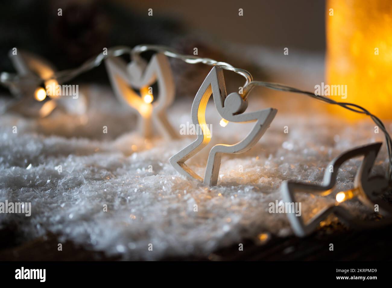christmas string lights in snow Stock Photo - Alamy