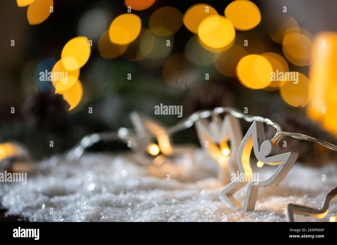 christmas string lights in snow Stock Photo - Alamy