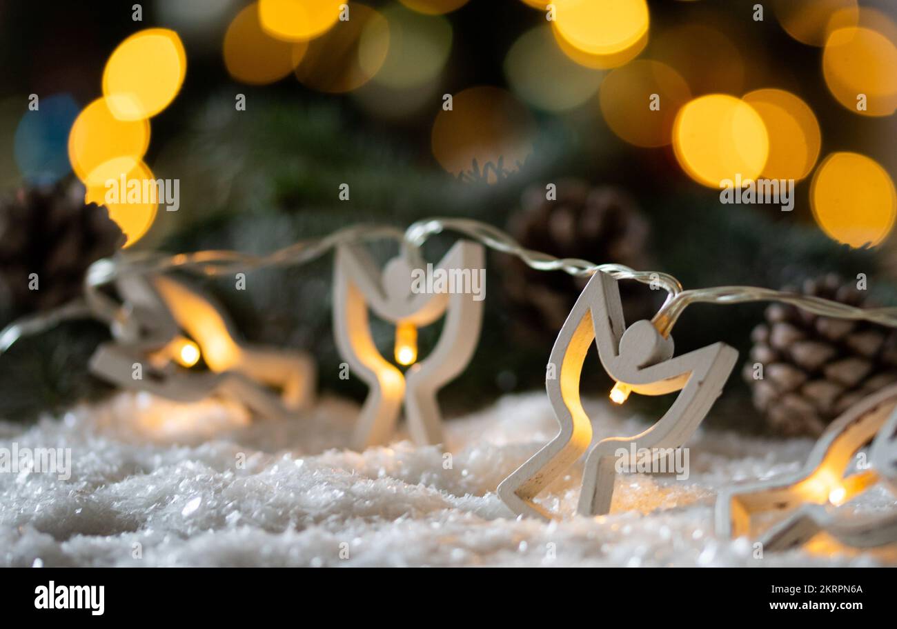 christmas string lights in snow Stock Photo - Alamy