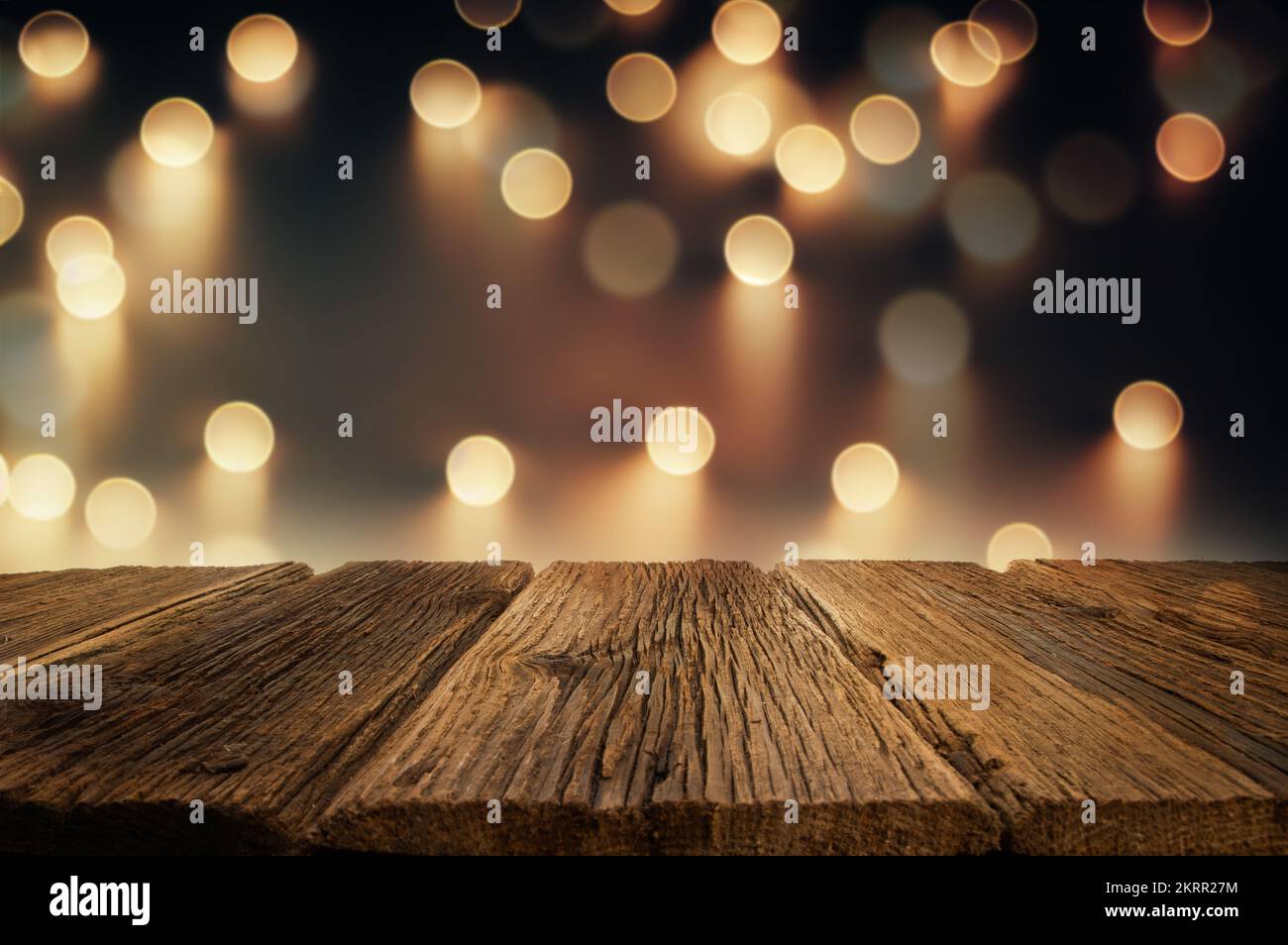 empty wooden table and Christmas lights Stock Photo - Alamy