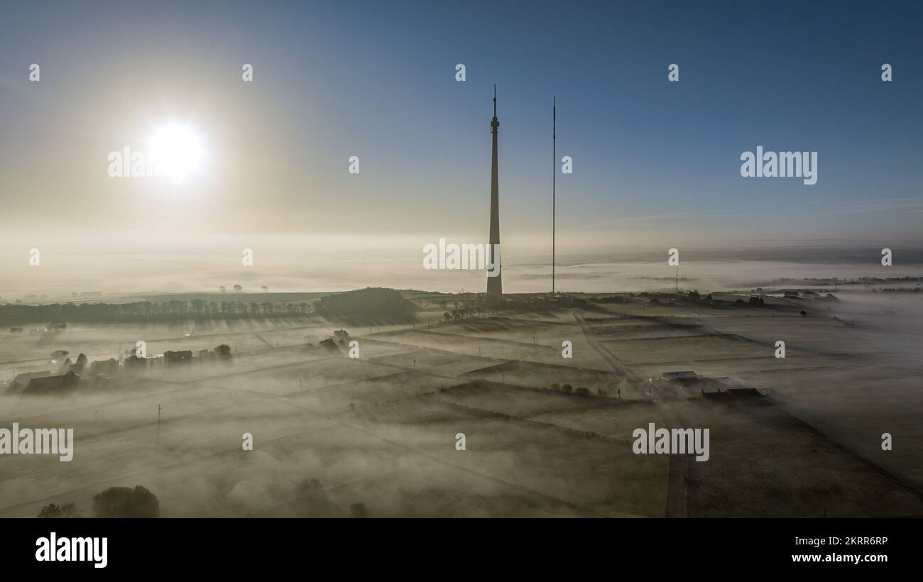 The Sun rises at Emley Moor Transmitting Tower as blanket of heavy Fog ...