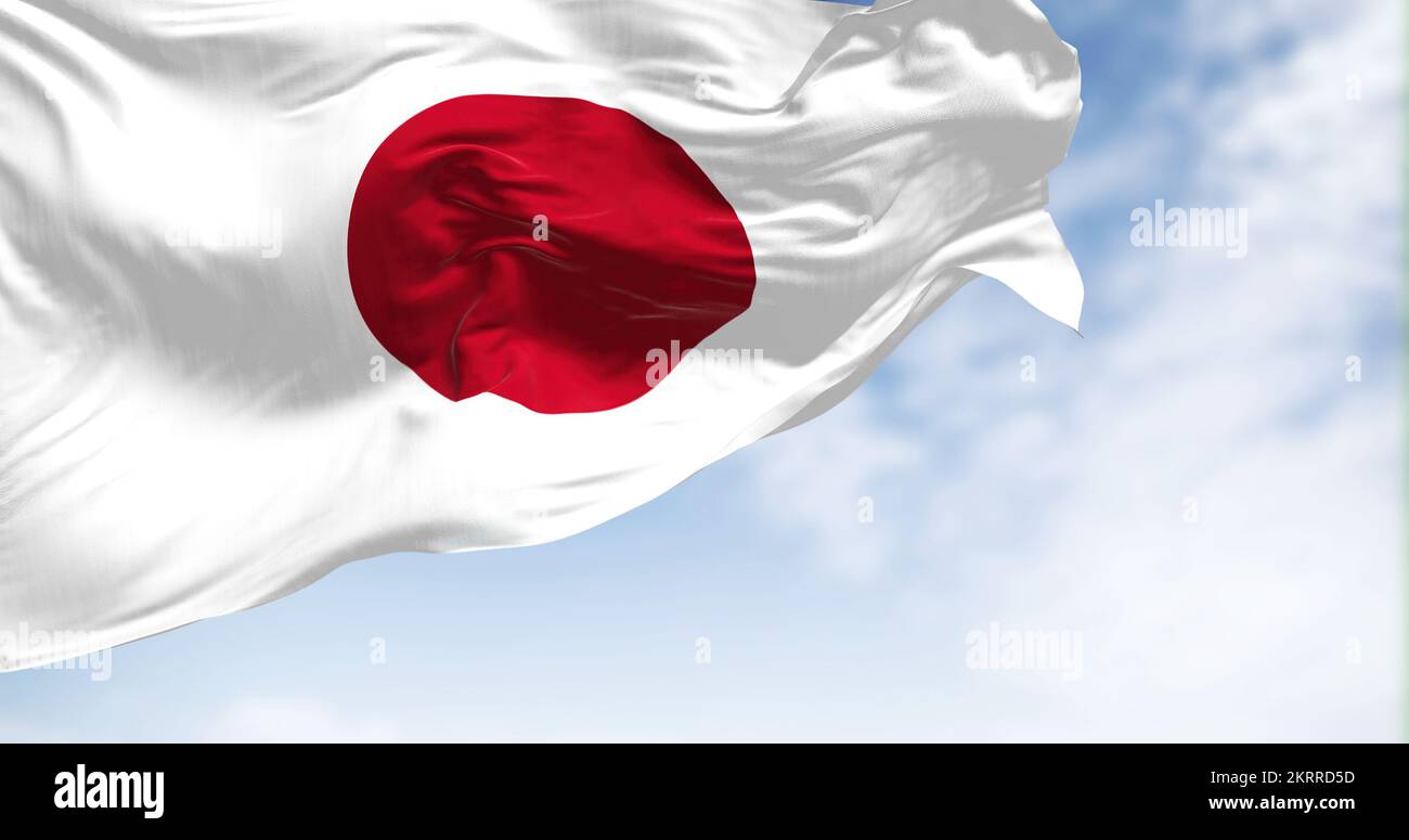 Close-up view of the Japan national flag waving in the wind. Japan is ...